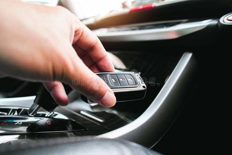 Close Up of a Driver Hand Holding a Car Keyless Remote in a Car, Driver ...