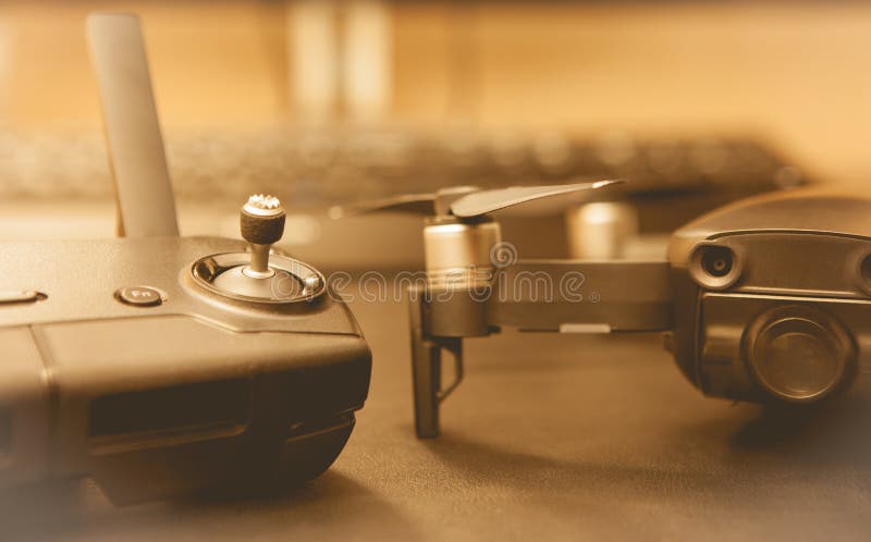 Close-up of a Drone Control Panel and Blur the Copter in the Background ...