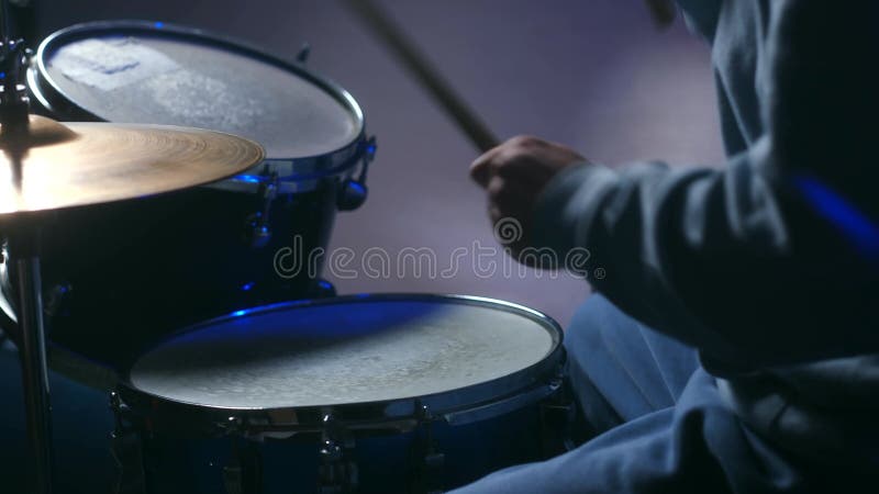 Close-up Drummer Immersed in Intense Practice on Drum Kit, Capturing ...