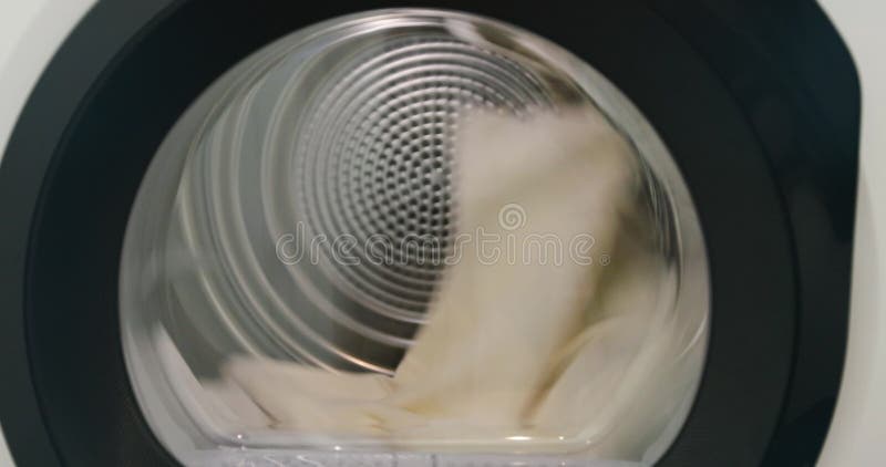 Close Up of Drying Machine. Drying Laundry Clothes. Dryer Laundry ...