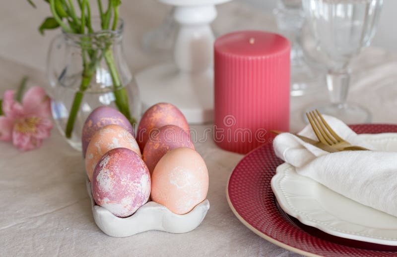 Close Up Easter Multicolored Eggs at Concrete Stand for Eggs on Table ...