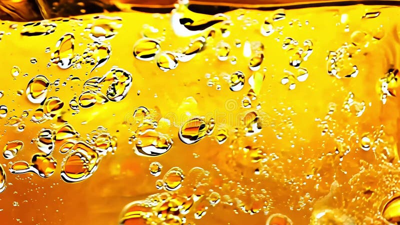 Close-Up of Effervescent Bubbles in Orange Liquid, Macro of Carbonation ...
