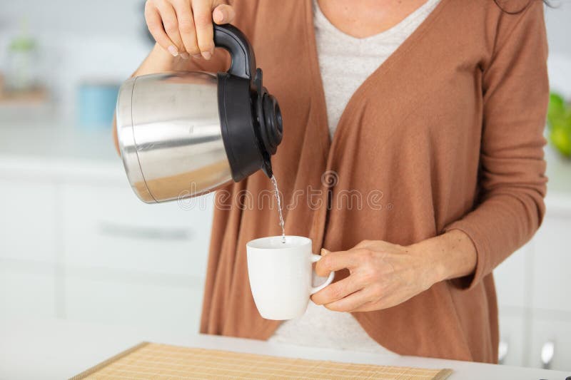 Close Up Elderly Woman Pouring Hot Tea Stock Image - Image of calm ...
