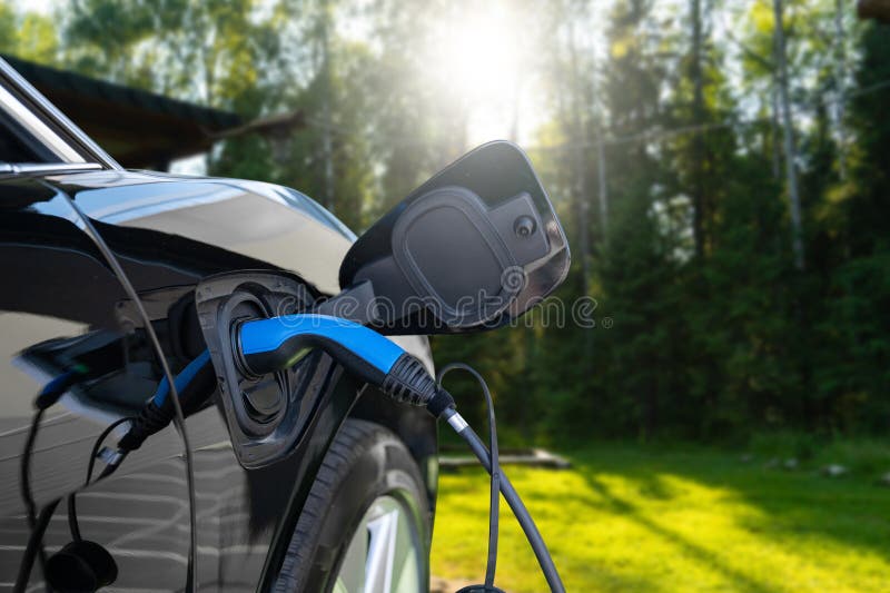 Close Up of Electric Car Inlet with a Connected Charging Cable Stock ...