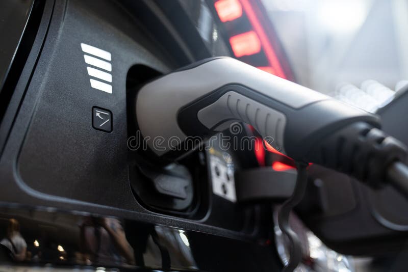 Close Up of Electric Car Inlet with a Connected Charging Cable Stock ...