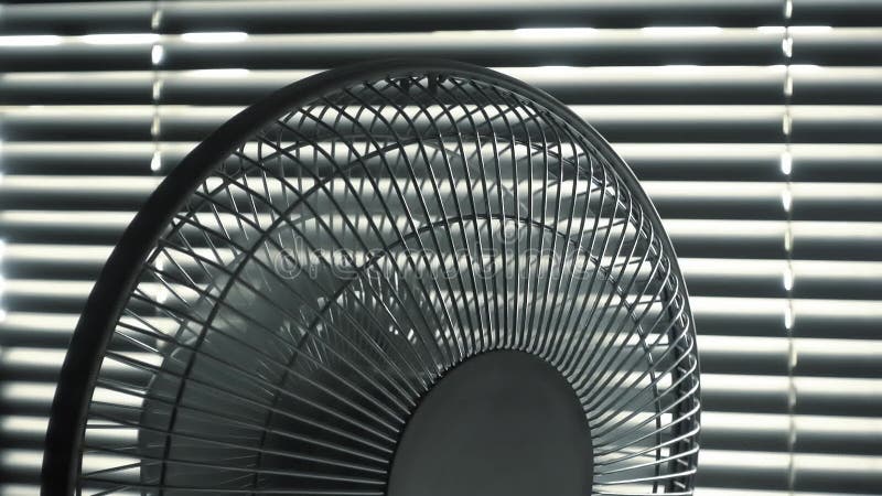 Electric Fan Ventilator Turning from Side To Side Blowing Wind. Air Fan ...