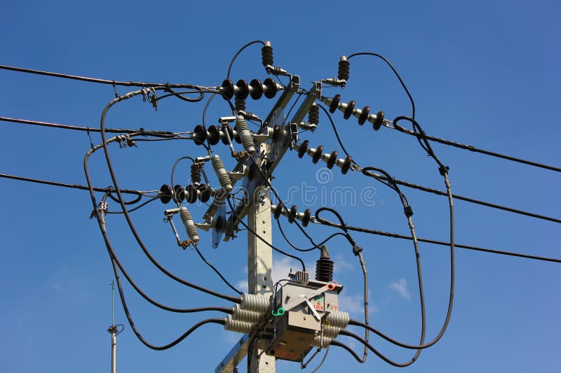 Close Up Electric Main Cable Connect To Transformer on Pole Against ...