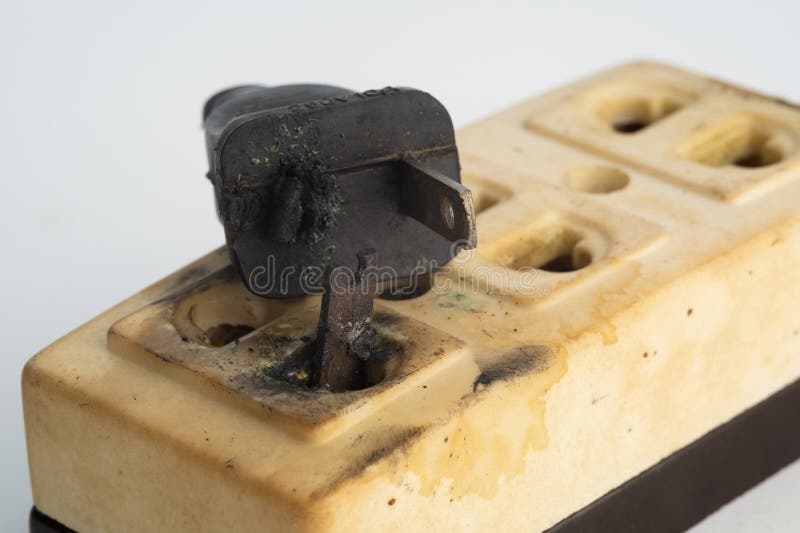 Close Up Electric Plug and Receptacle Burnt and Damaged from Amp ...