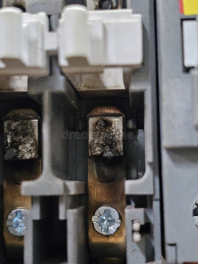 A Close-up of an Electrical Contactor with Signs of Arcing and Burning ...