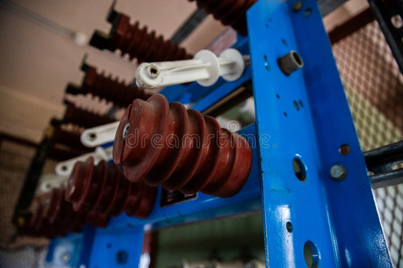 Close-Up of Electrical Insulators on Blue Industrial Frame Stock Image ...