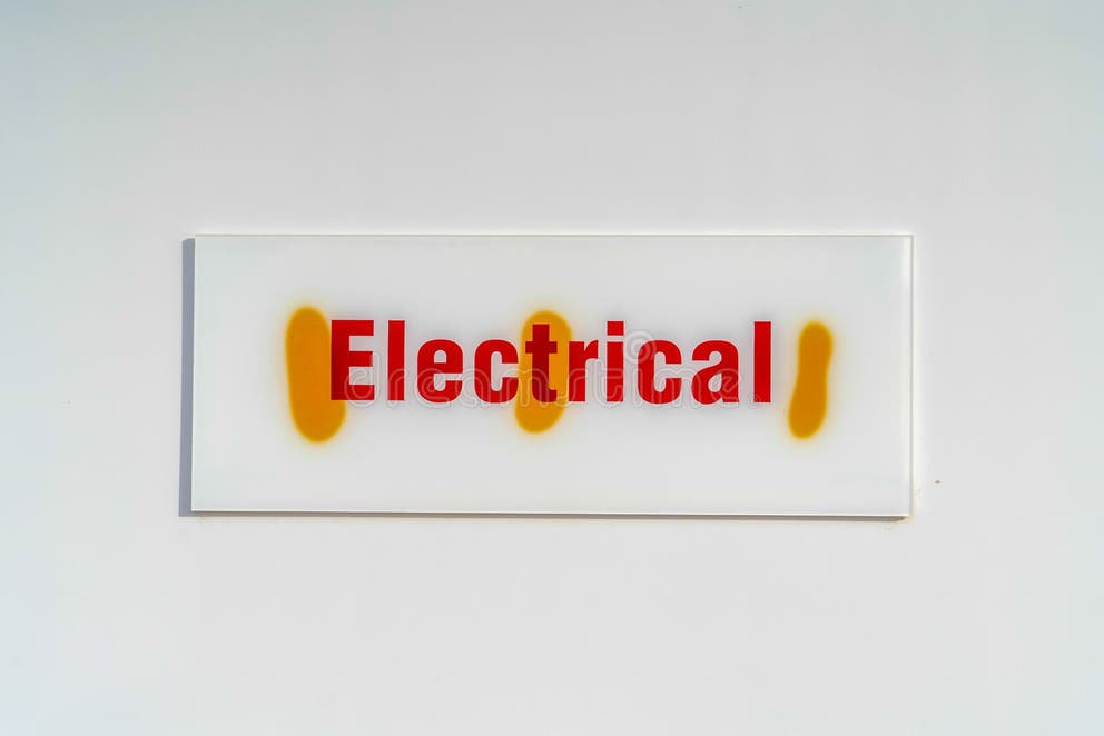 Close Up of an Electrical Sign Board Against a White Wall Stock Image ...