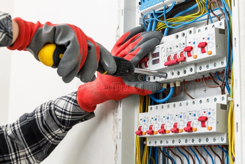Close Up of Electrician S Hands in Working Gloves Installing and ...