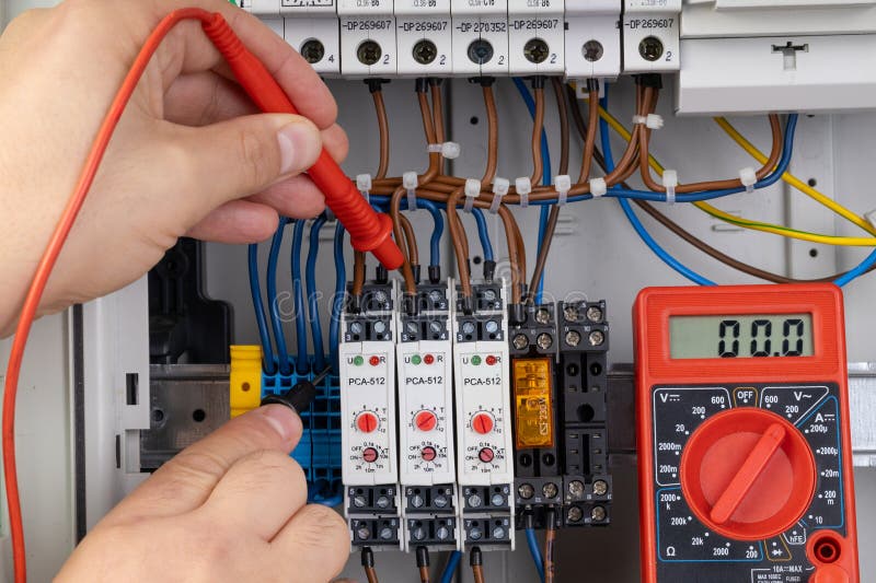 Electrician Using Multimeter To Test Electrical Connections Stock ...