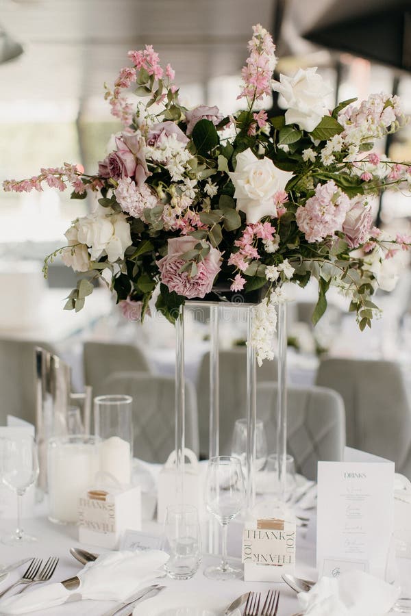 Close-up of an Elegant Table Setting with Vase and Silverware Stock ...