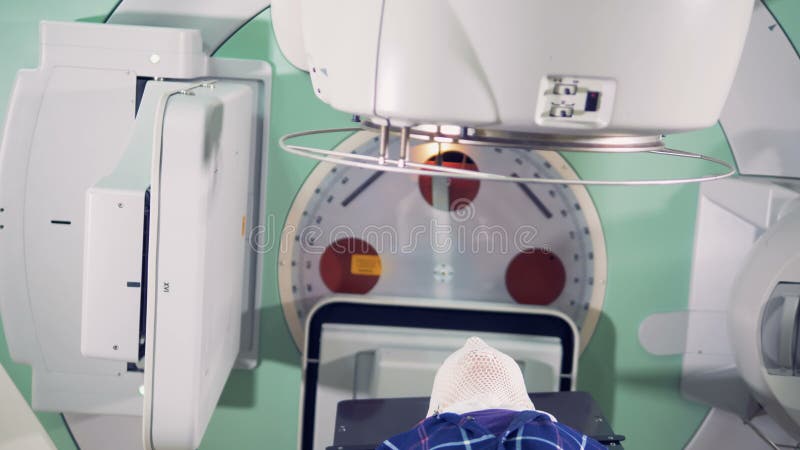 Linear Accelerator is Radiating a Patient in Treatment Process. Modern ...
