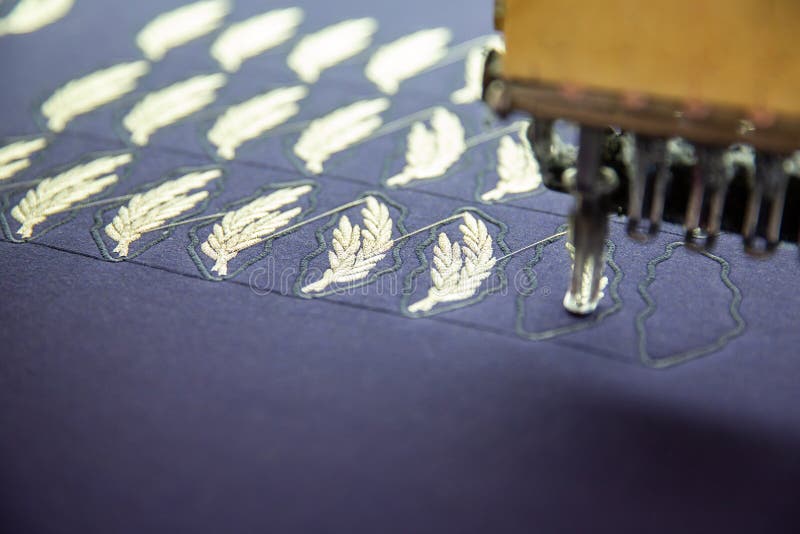 Close Up with Embroidery Machine Working on a Blue Matrix Stock Image ...