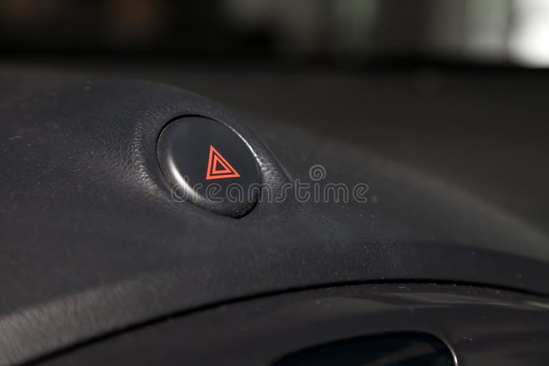 Close-up on Emergency Button with Red Icon on the Car Dashboard ...