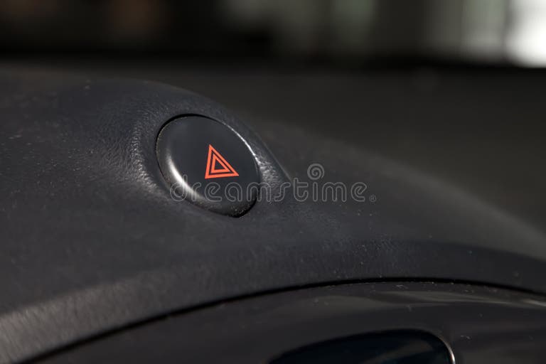 Close-up on Emergency Button with Red Icon on the Car Dashboard ...