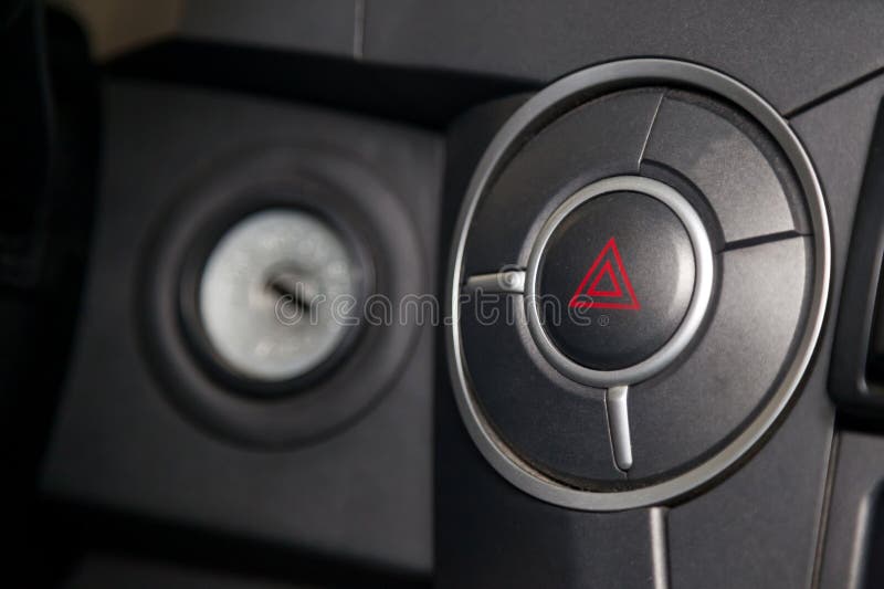 Close-up on Emergency Round Button with Red Triangle Icon on the Car ...