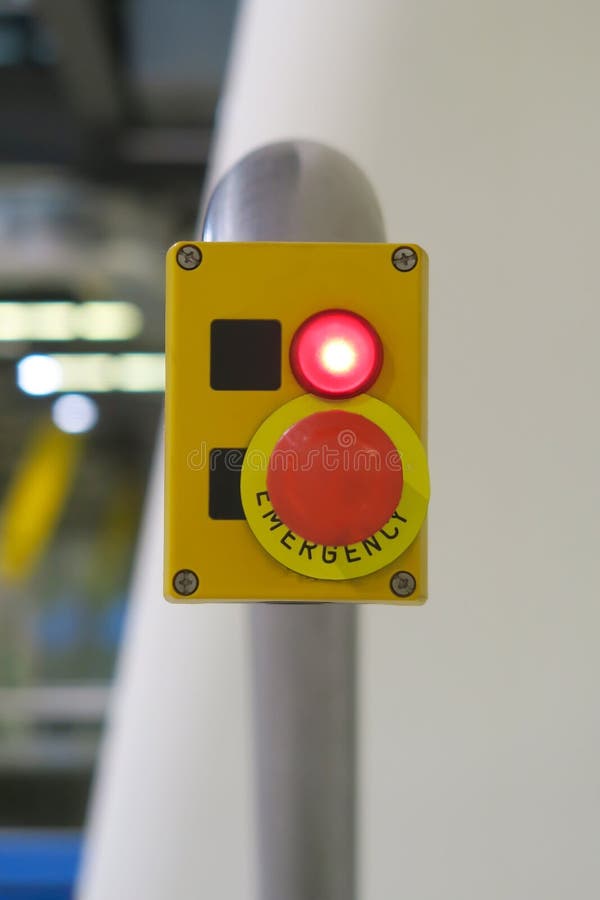 Close Up of an Emergency Stop Push Button with a Red Light on, Vertical ...