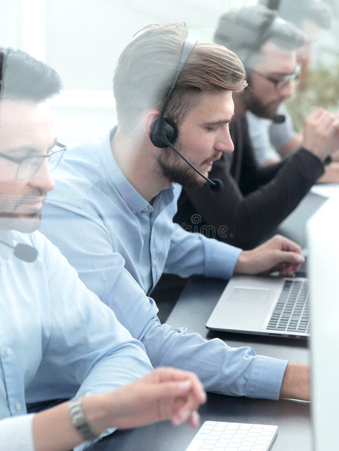 Close Up.employees Call Center in the Workplace Stock Image - Image of ...