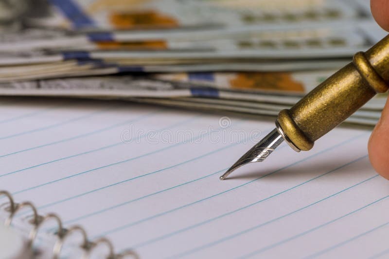 Close Up of Empty Notepad a Pen on the Dollars Stock Photo - Image of ...