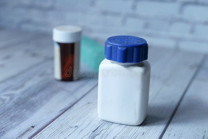 Close Up of Empty Pill Container on Table Stock Image - Image of ...