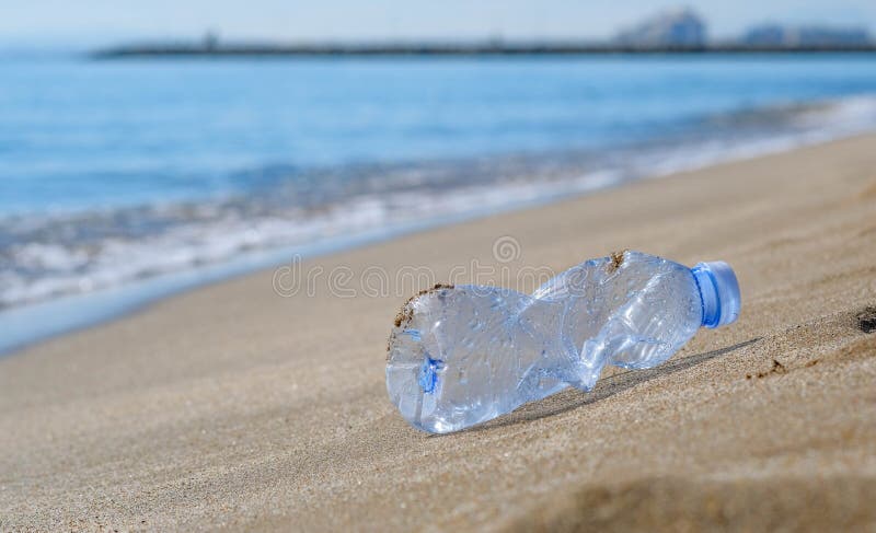 Close Up of Empty Plastic Bottle on Sandy Beach in Spain Stock Image ...