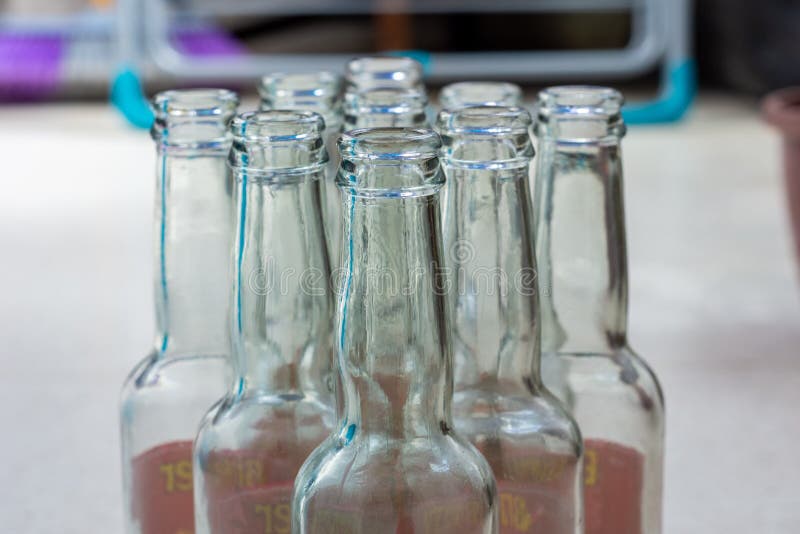 Close Up Empty Soft Drinks Glass Bottles on the Floor. Stock Image ... Close Up Empty Soft Drinks Glass Bottles on the Floor. Stock Image ...