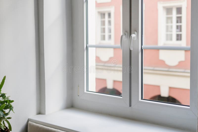 Close Up of Empty Windowsill and Plastic Windows with White Frames ...