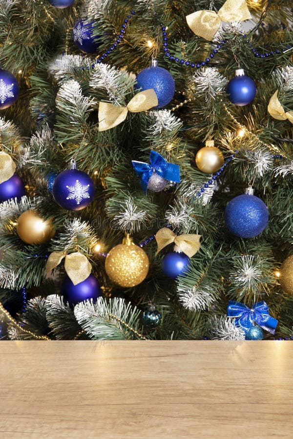 Empty Wooden Surface with Christmas Tree in Background Stock Photo ...