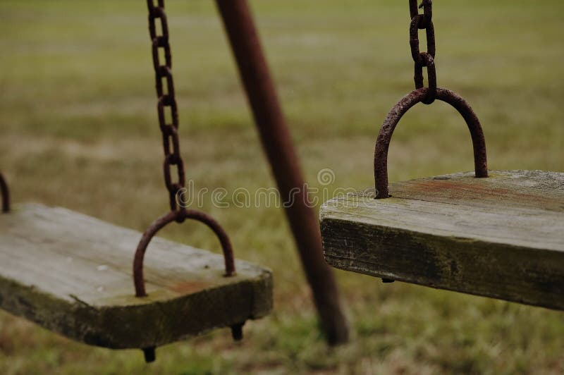A Close Up of the Ends of Two Swings Stock Photo - Image of enjoy ...