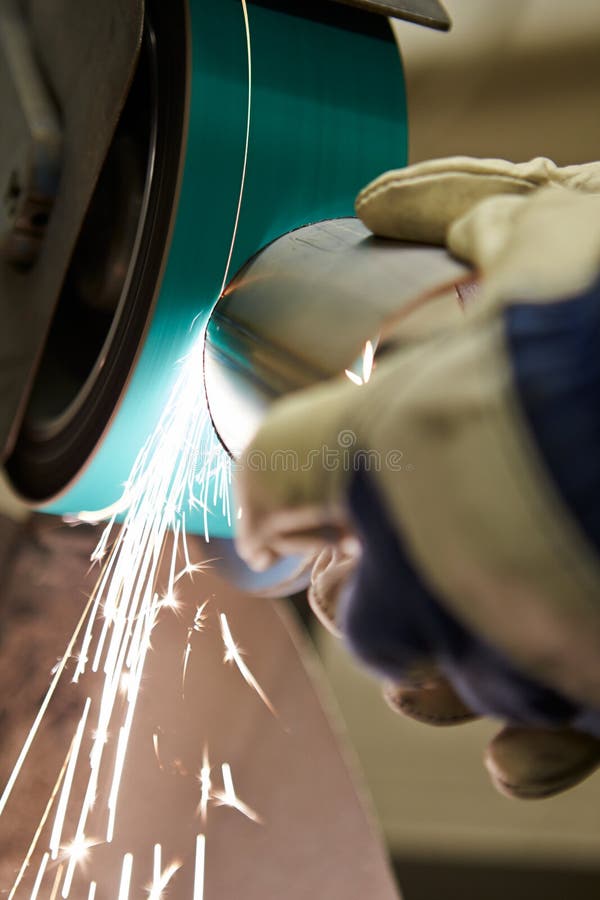 Close Up of Engineer Using Grinding Machine in Factory Stock Image ...