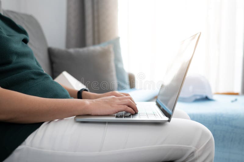 Close Up Engineer Woman Hand is Using Laptop for Work with Blueprint ...
