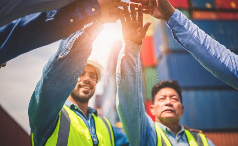 Close-up of Engineering Team Making Pile of Hands with Cargo Container ...