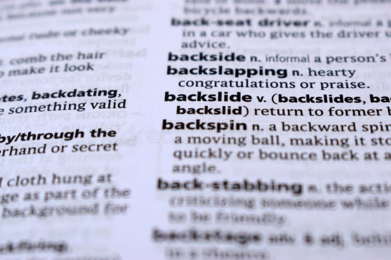 Close Up of English Dictionary Page with Definition Word -Backslide ...