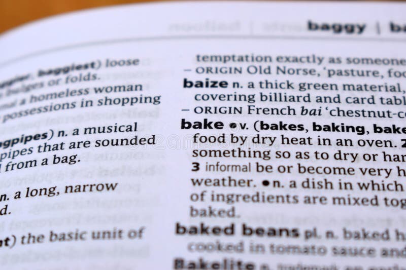 Close Up of English Dictionary Page with Definition Word - Bake Stock ...
