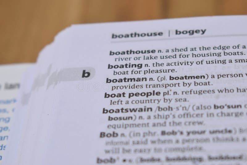 Close Up of English Dictionary Page with Word - Boatman Stock ...