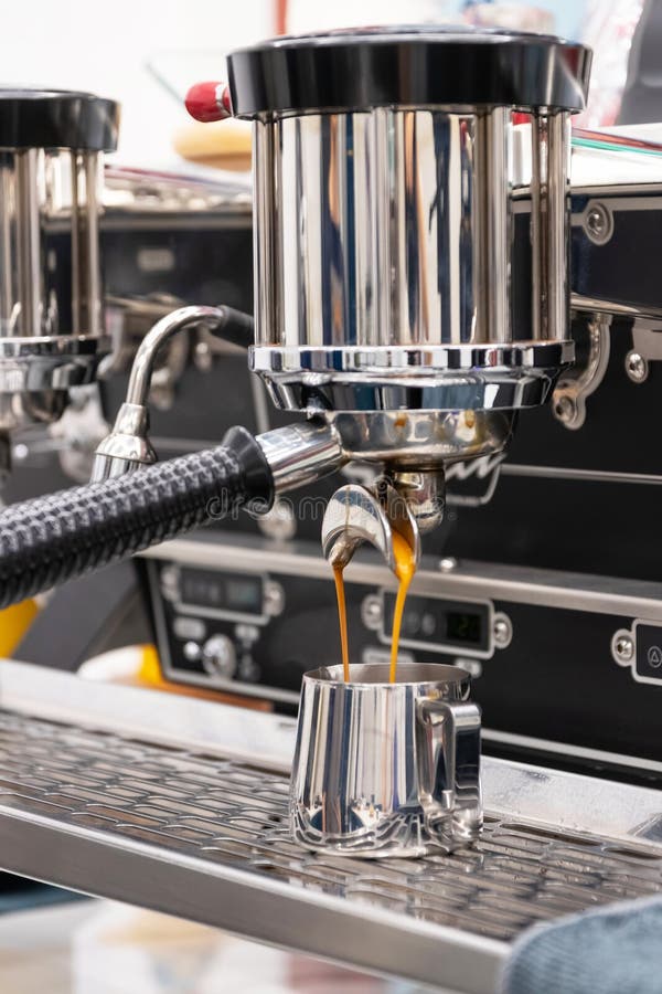 Close-up of Espresso Extraction Process from a Coffee Machine ...