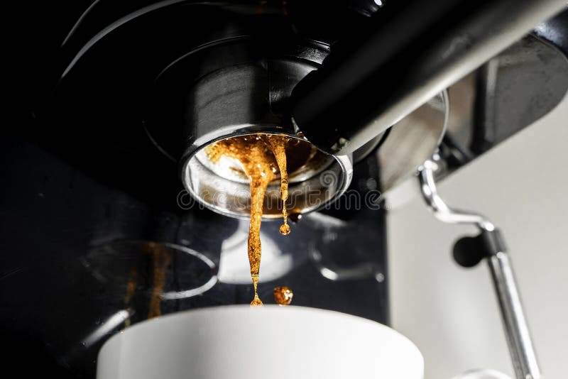 Close-up of Espresso Pouring from a Coffee Machine, Inside the House ...