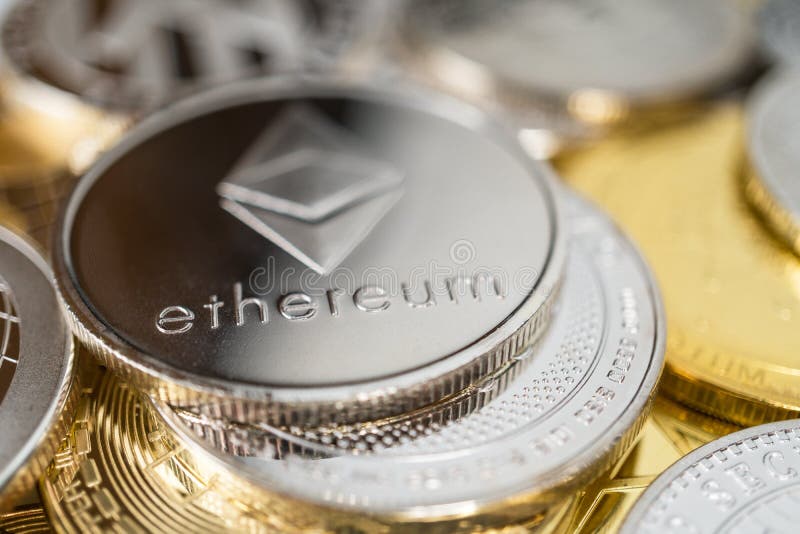 Stack of Ether Coins or Ethereum on Gold Background To Illustrate ...