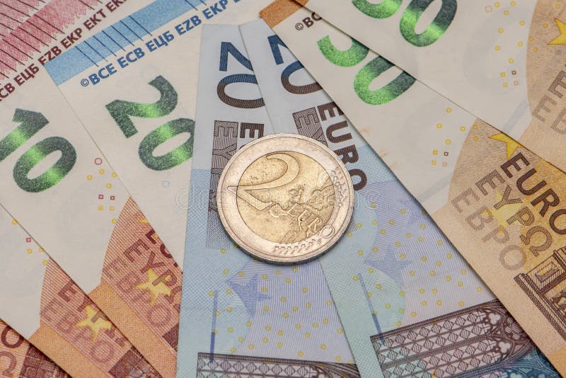 Close-up of European Banknotes and 2 Euro Coins, Close-up, Selective ...