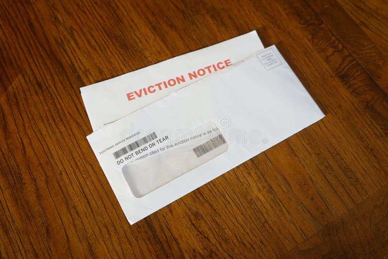 Close-up of an Eviction Notice in Envelope on Desk Stock Image - Image ...