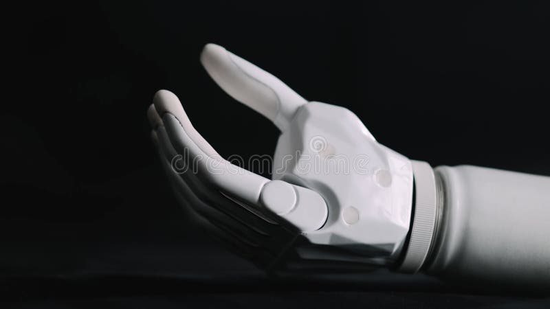 Close Up Examines and Checking Movement of Fingers High-tech Bionic Arm ...