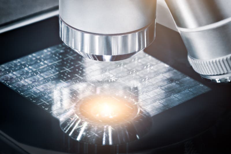 Close Up Of Examining Of Test Sample Of Microchip Transistor Under The ...