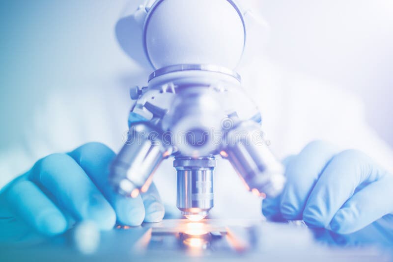 Close Up of Examining of Test Sample Under the Microscope Stock Image ...