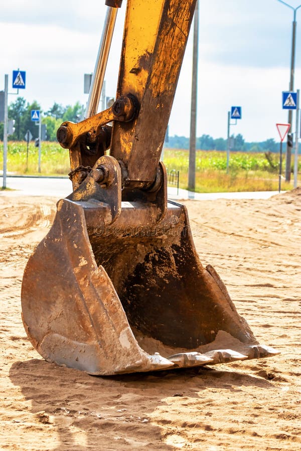 Close Up of Excavator Bucket at Construction Site. Construction ...
