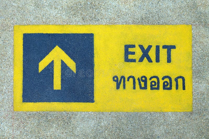 Close Up Exit Sign on the Ground. Stock Photo - Image of conceptual ...