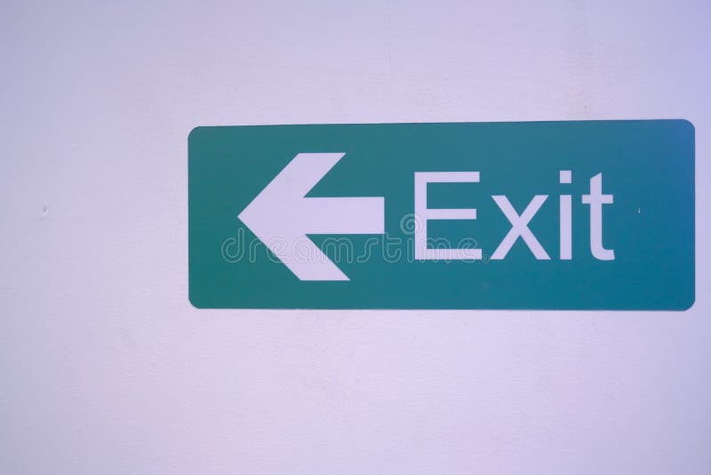 Close Up of Exit Sing on Wall with Copy Space Stock Photo - Image of ...
