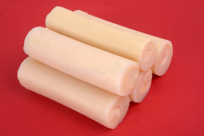 Hearts of Palm Stacked Close Up on Red Background Stock Image - Image ...